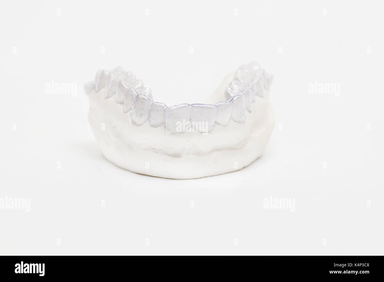 Close-up individual tooth tray Orthodontic dental theme. Invisible ...