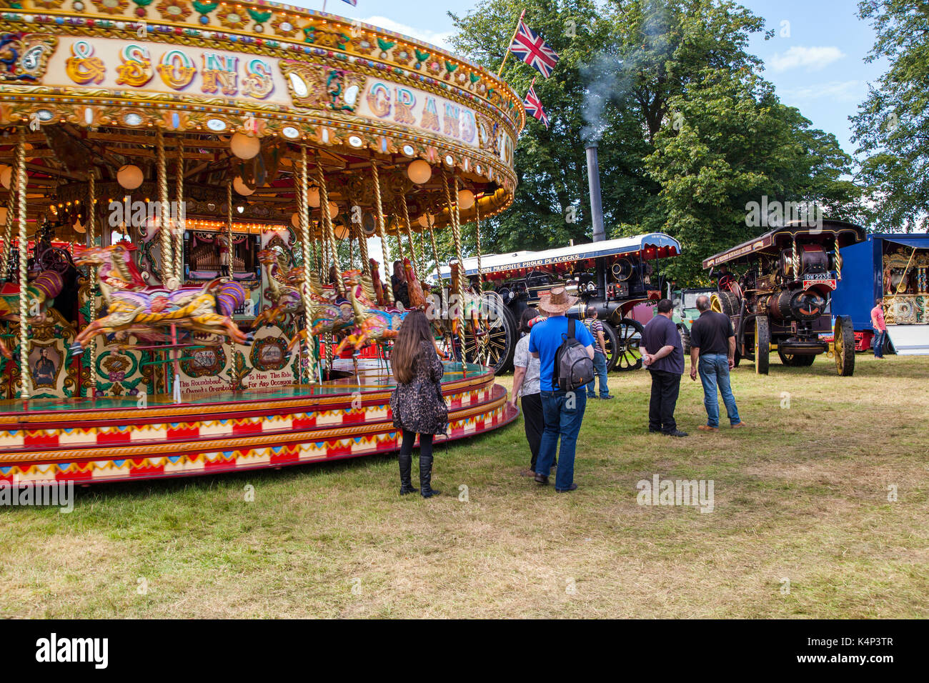 Vintage funfair hobby horse roundabout at the annual steam rally at ...