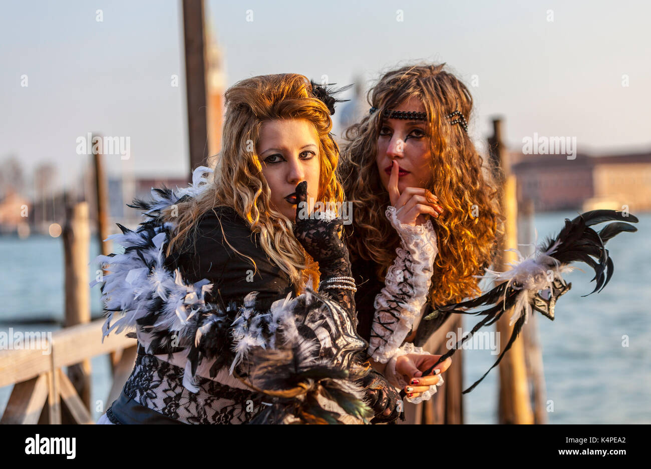 Two women in elegant black hi-res stock photography and images - Alamy