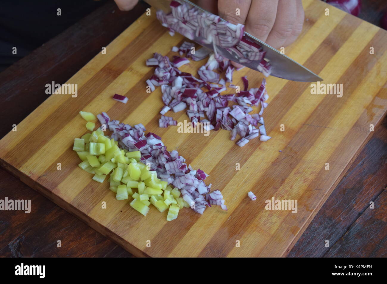 Male chef chopping garlic knife hi-res stock photography and images - Alamy