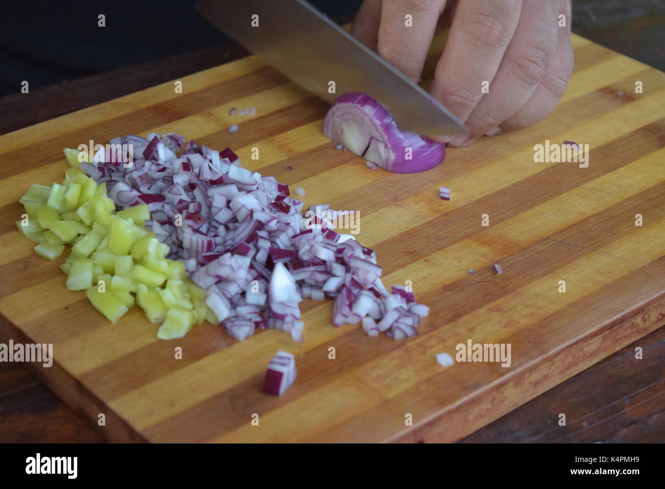 Close up of a chef's hands chopping Stock Photo - Alamy
