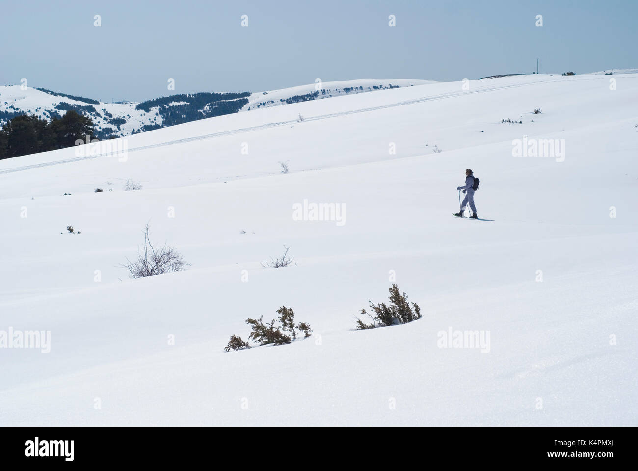 Alone in a snow field with snowshoes in French Riviera Stock Photo - Alamy