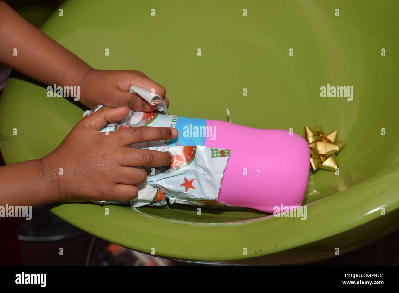 Ripped open gift hi-res stock photography and images - Alamy