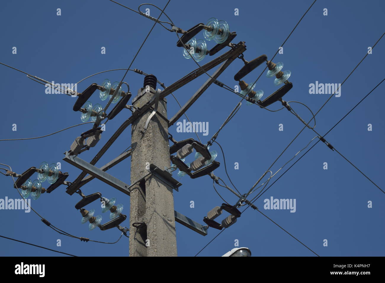 Tall electric line on a pole Stock Photo - Alamy