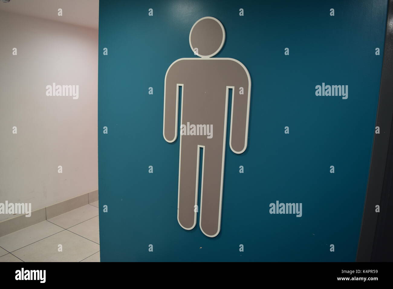 Colorful toilet sign in a mall Stock Photo - Alamy