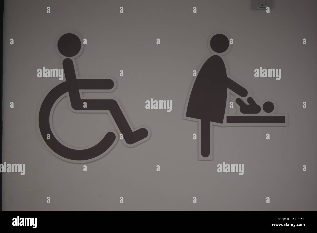 Colorful toilet sign in a mall Stock Photo - Alamy