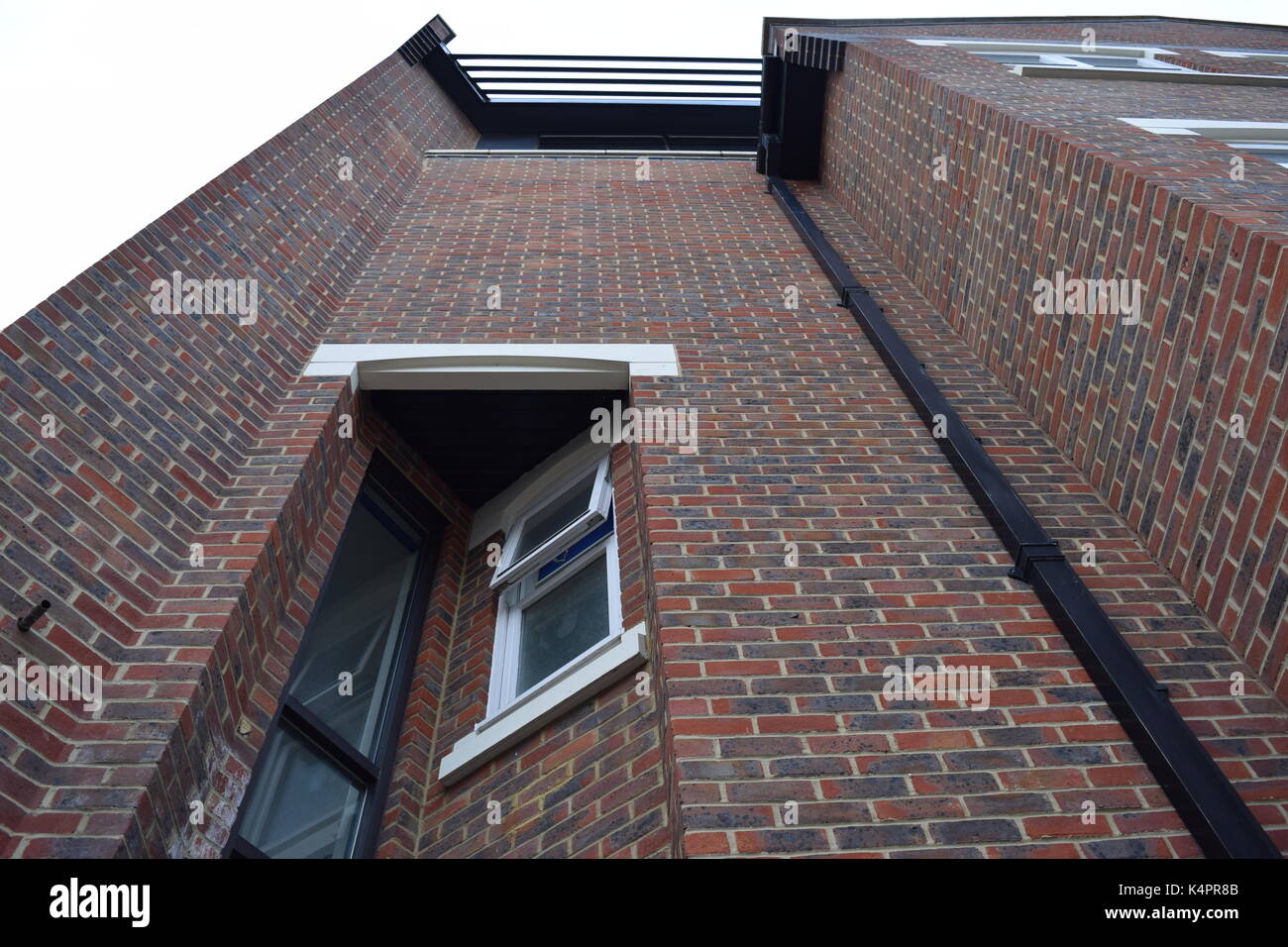 Perspective view of the side of a house building Stock Photo - Alamy