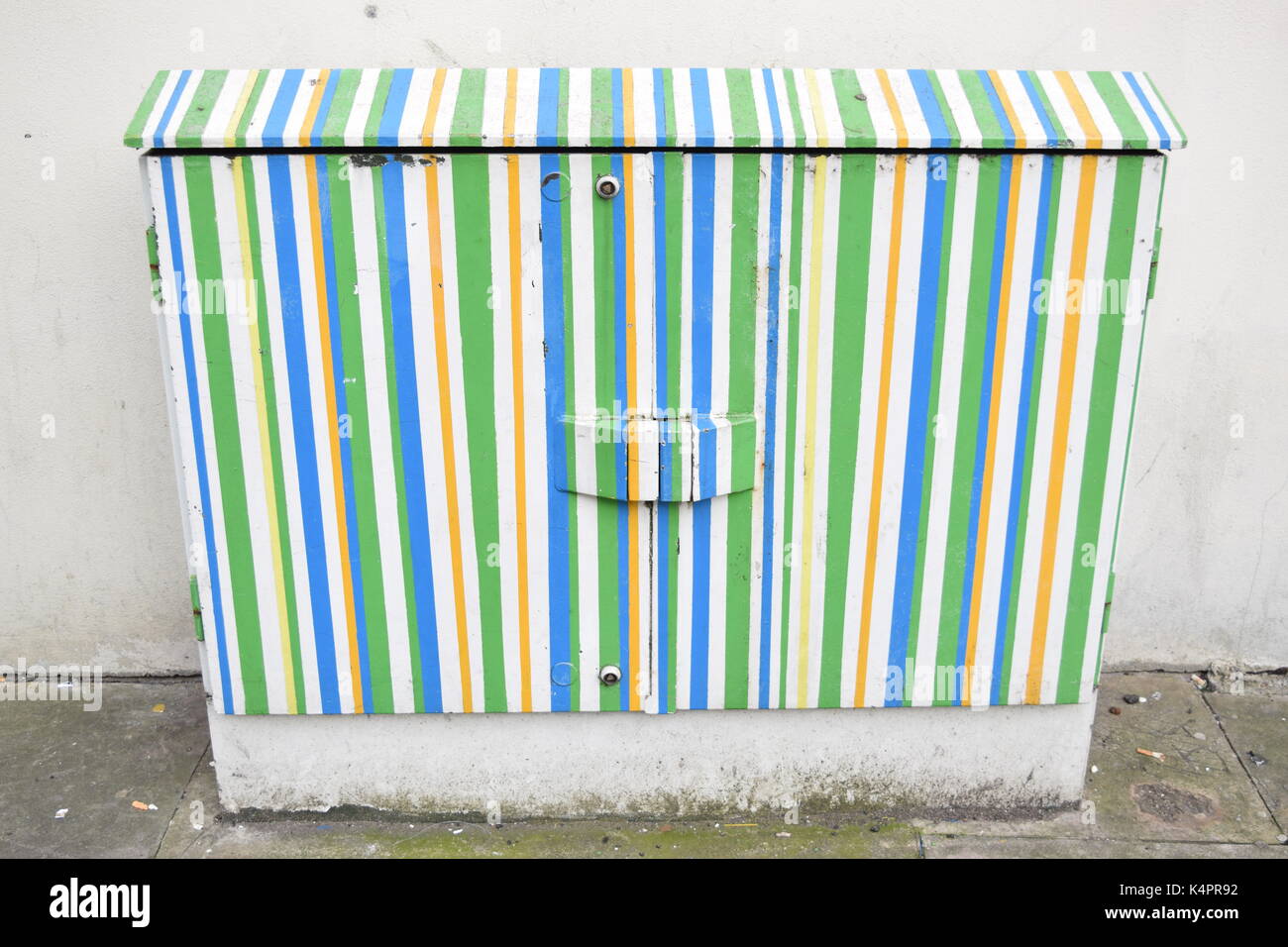 Electric meter painted outdoors Stock Photo - Alamy