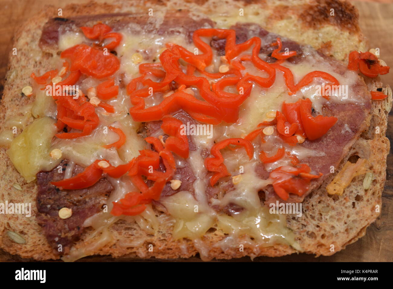 Cheesy hot ham sandwich Stock Photo - Alamy