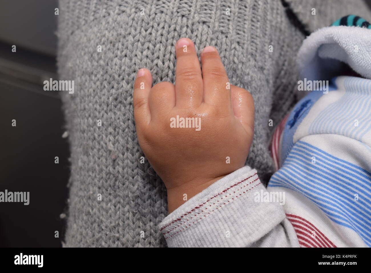 Small baby's hand Stock Photo - Alamy