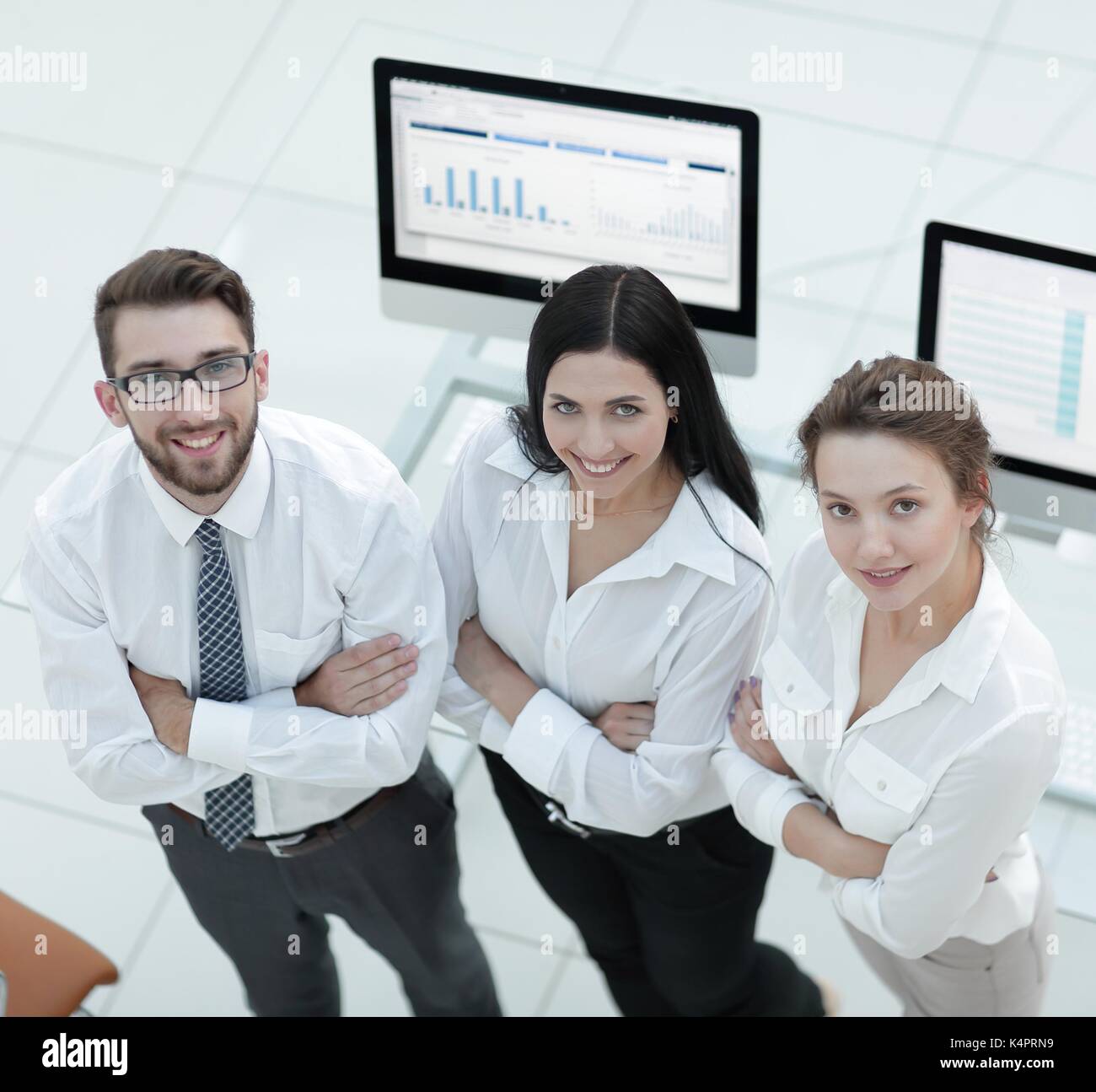 successful business team standing near workplace Stock Photo - Alamy