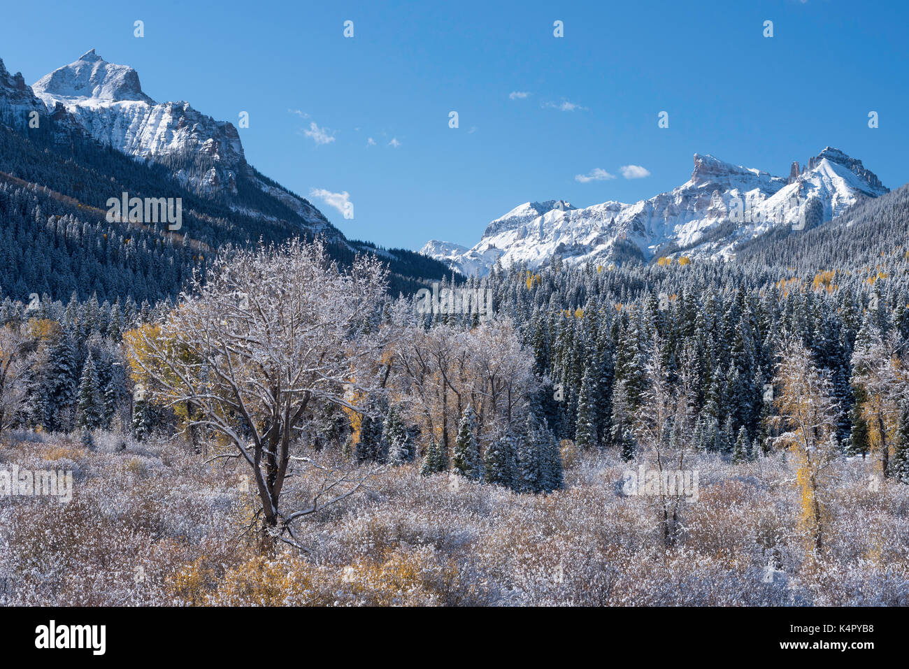 Redcliff Peak and Coxcomb Peak viewed from Cimarron River Valley after ...