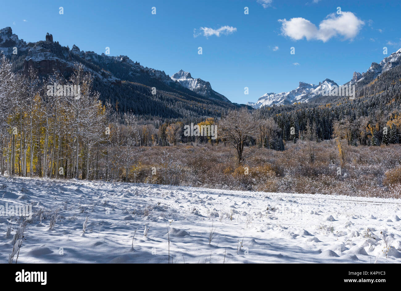 Redcliff Peak and Coxcomb Peak viewed from Cimarron River Valley after ...