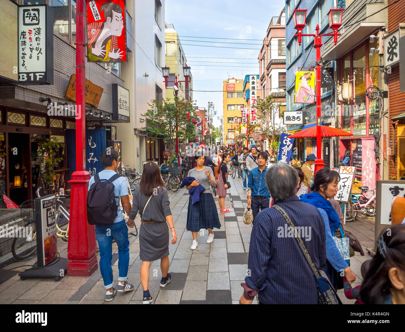 TOKYO, JAPAN JUNE 28 - 2017: Unidentified people looking at the stores ...
