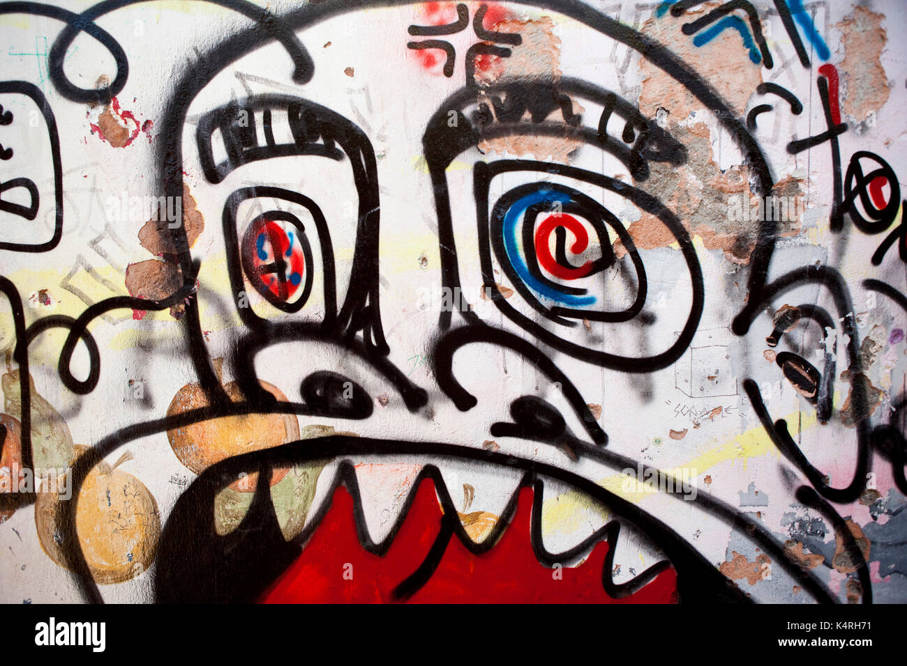 Head of a colorful graffiti on a wall Stock Photo - Alamy