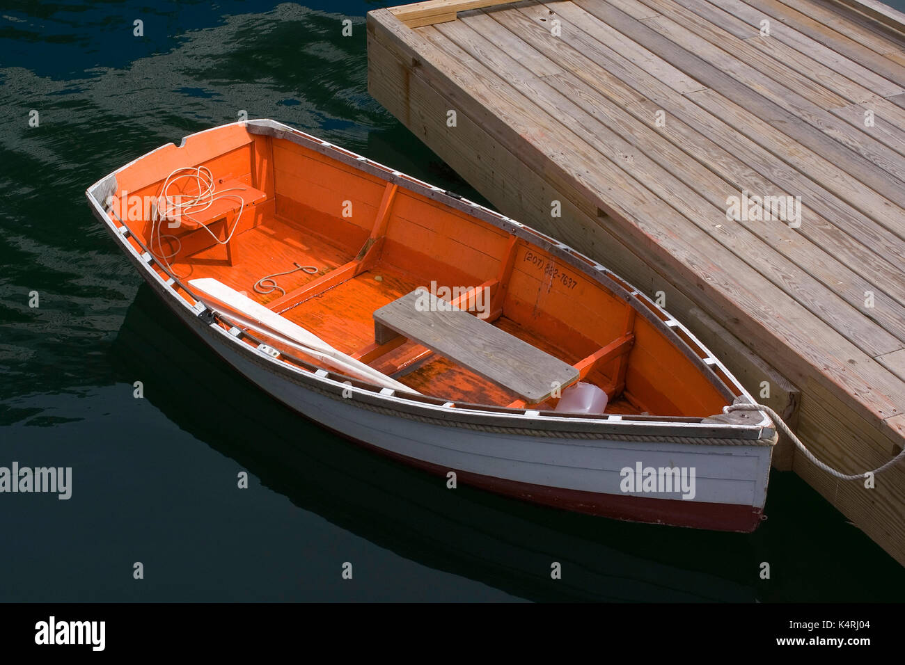 A rowboat at the town dock in Boothbay Harbor, Maine Stock Photo - Alamy