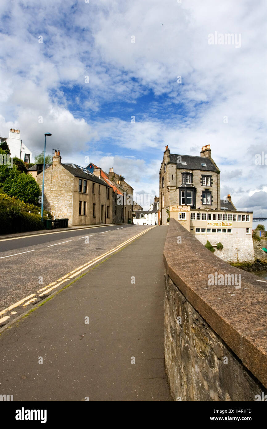 Road leading to cobbled High Street in South Queensferry near Edinburgh ...