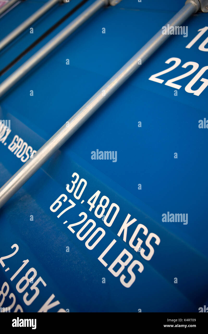 Signs on freight containers in a port Stock Photo - Alamy
