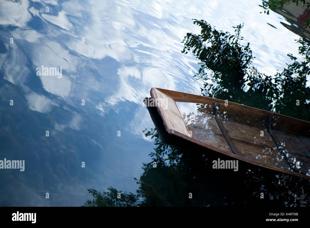 Fishing boat drowned in a river in Summer Stock Photo - Alamy