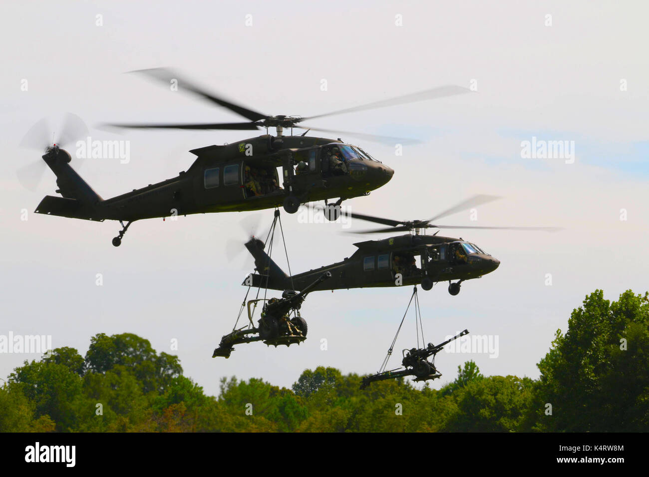 Two UH-60 Black Hawk helicopters of the 101st Combat Aviation Brigade ...