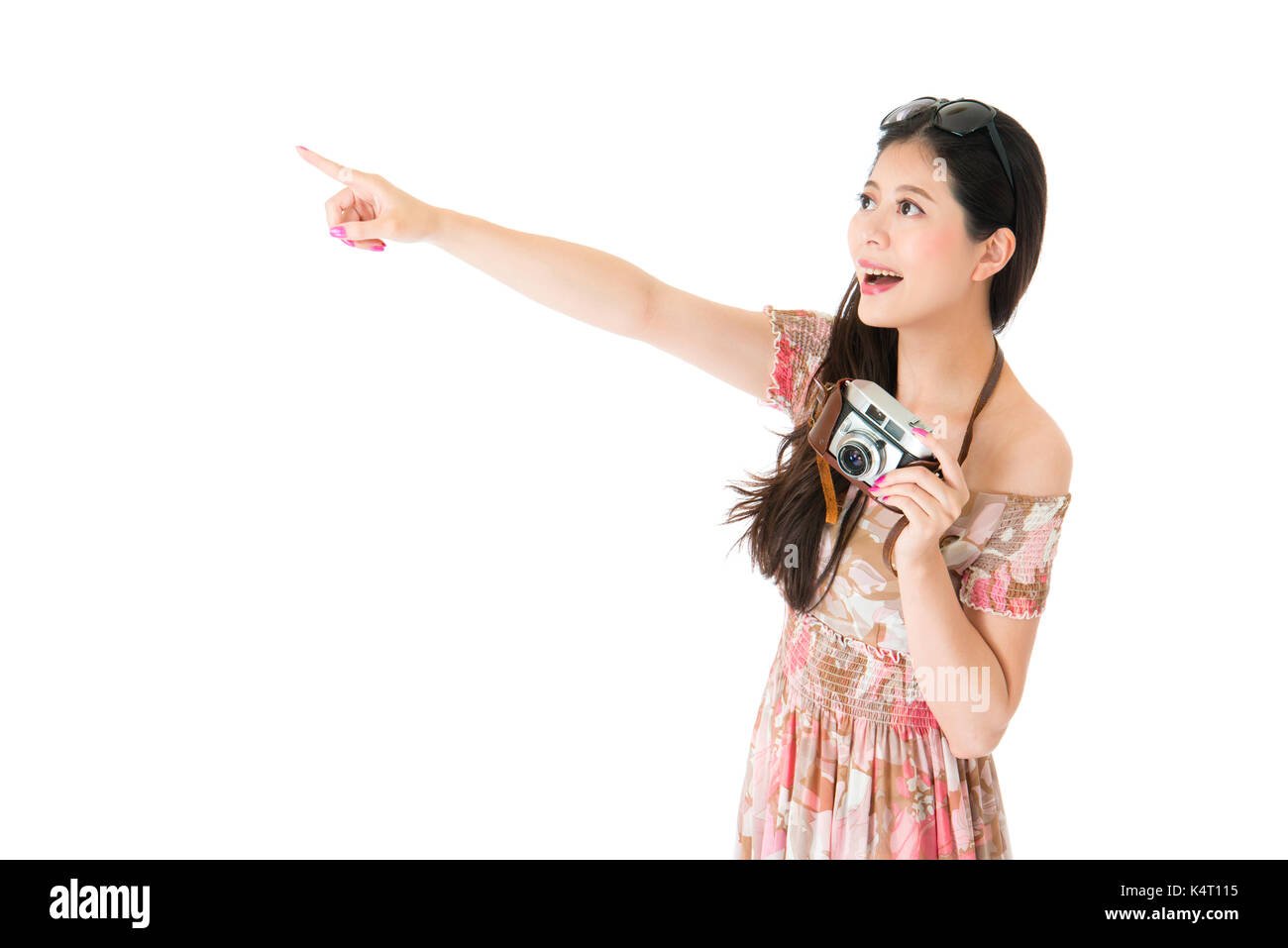 Happy girl pointing finger Cut Out Stock Images & Pictures - Alamy