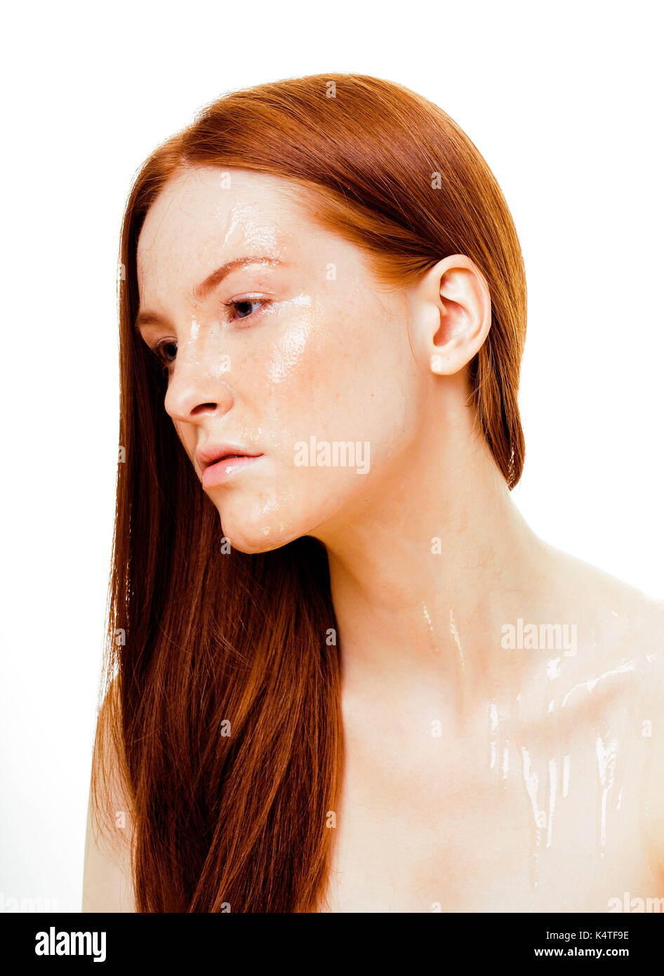 red hair woman with drops on her face Stock Photo - Alamy