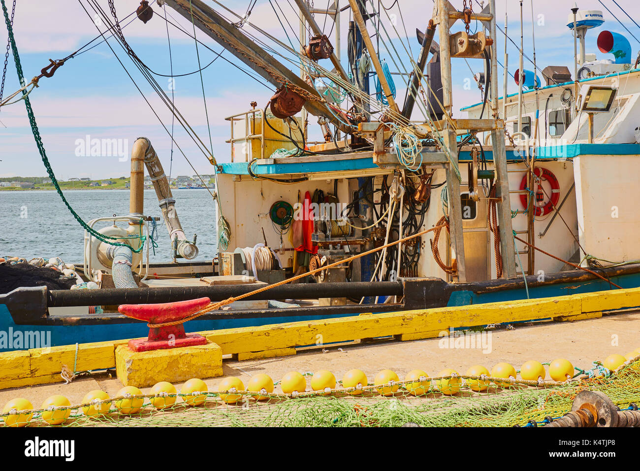 Fishing trawler and nets, Port au Choix on the Gulf of St Lawrence ...