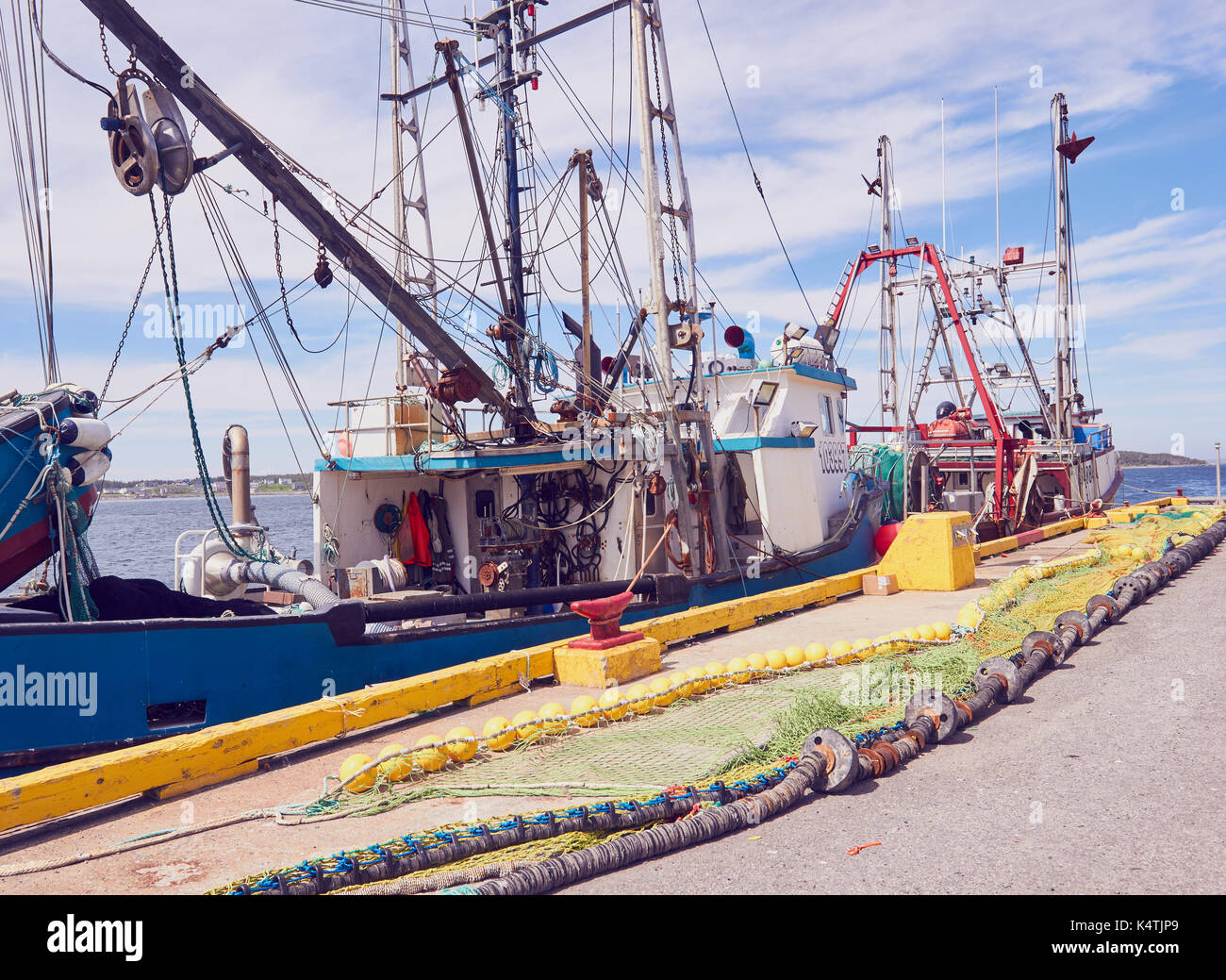Fishing nets on quay, Port au Choix on the Gulf of St Lawrence, Western ...
