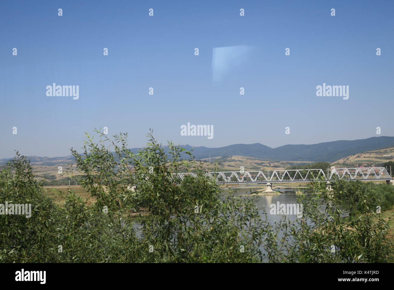 Interesting bridge over river in countryside in Romania Stock Photo - Alamy
