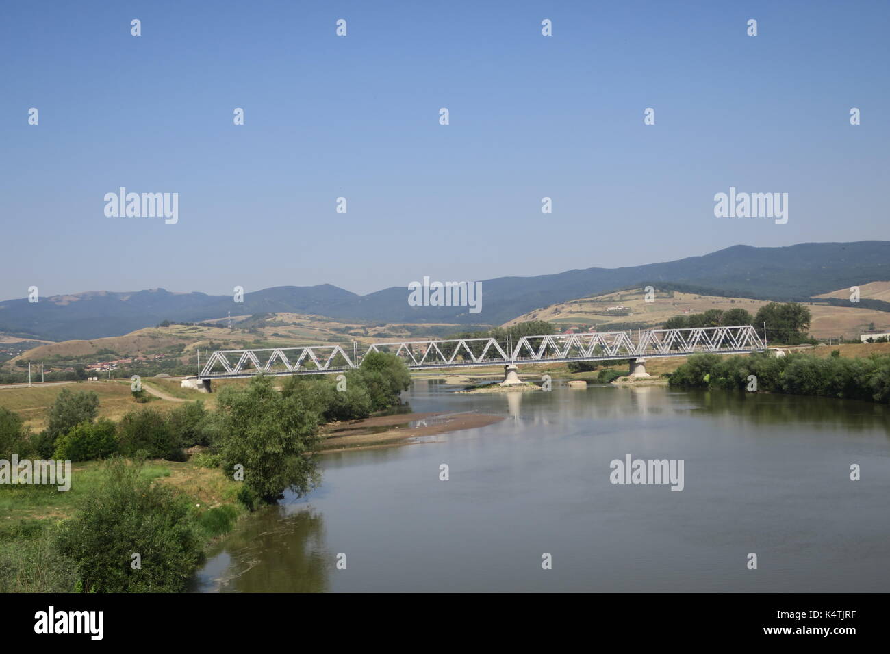 Interesting bridge over river in countryside in Romania Stock Photo - Alamy