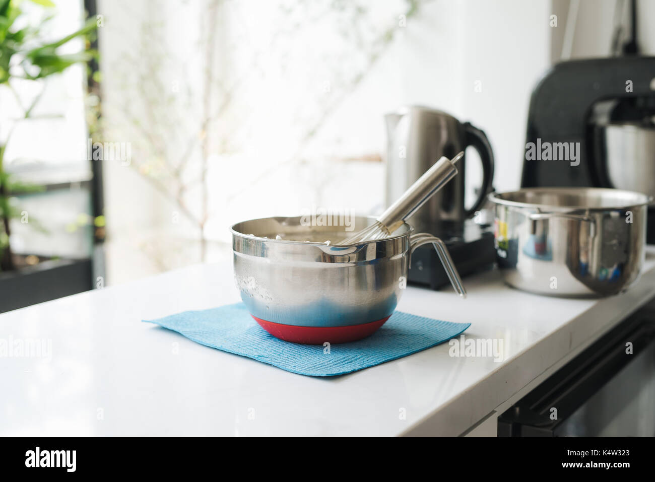 Bakery chef cooking bake in the kitchen professional Stock Photo - Alamy