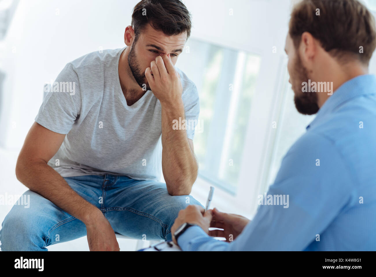 Men talk problems hi-res stock photography and images - Alamy
