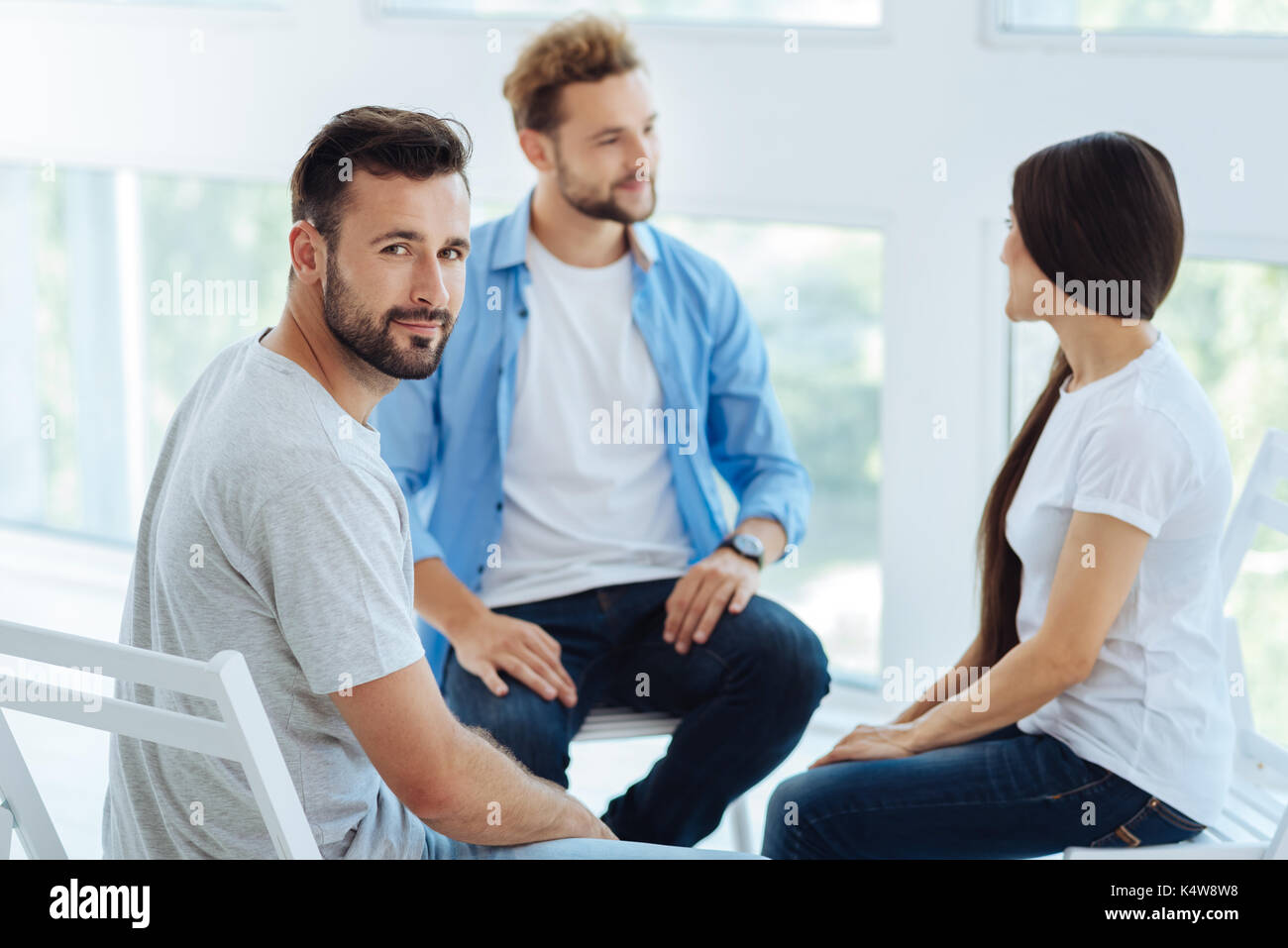 Handsome bearded man looking at you Stock Photo - Alamy