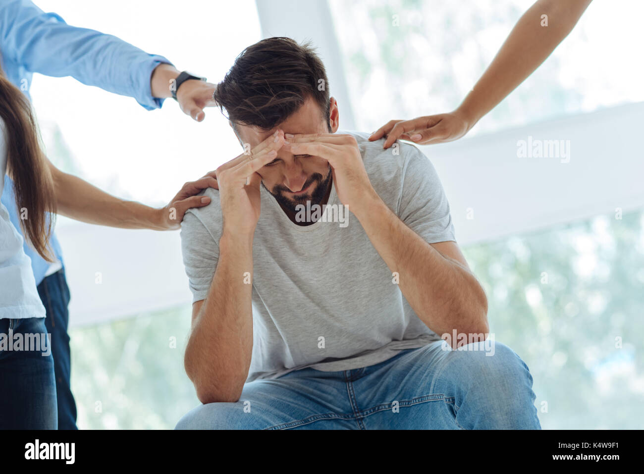 Handsome stressed out man having a depression Stock Photo - Alamy