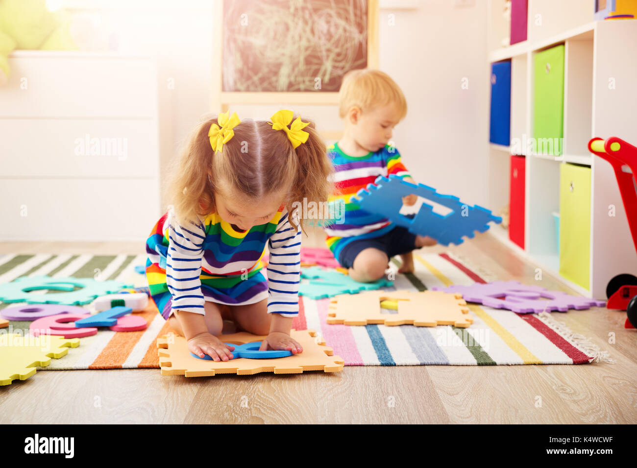 Little child playing with numbers Stock Photo - Alamy
