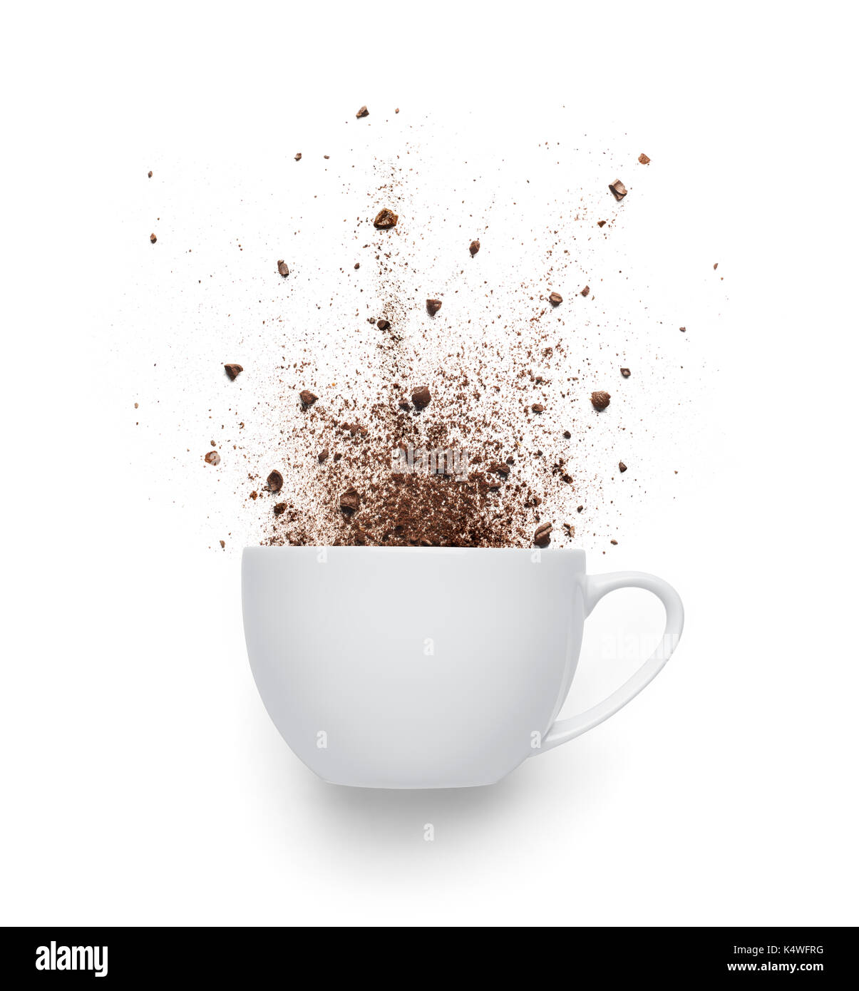 Coffee powder spilled out from cup over white background Stock Photo ...