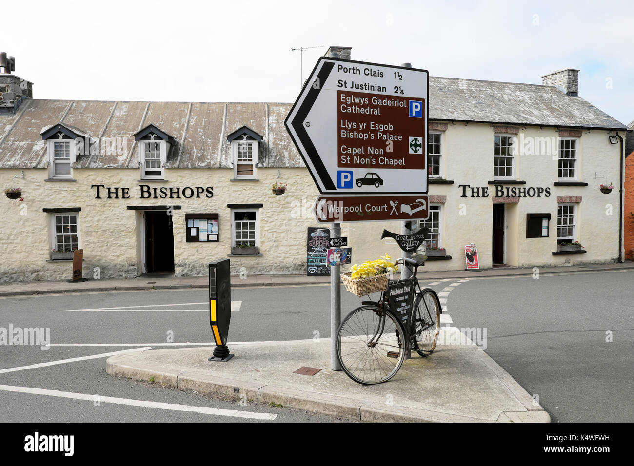 Tourist information sign near the Bishops pub on the square in St David ...