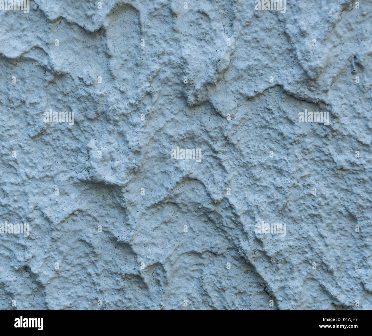 Rough stucco textured background of wall with natural light. Abstract ...