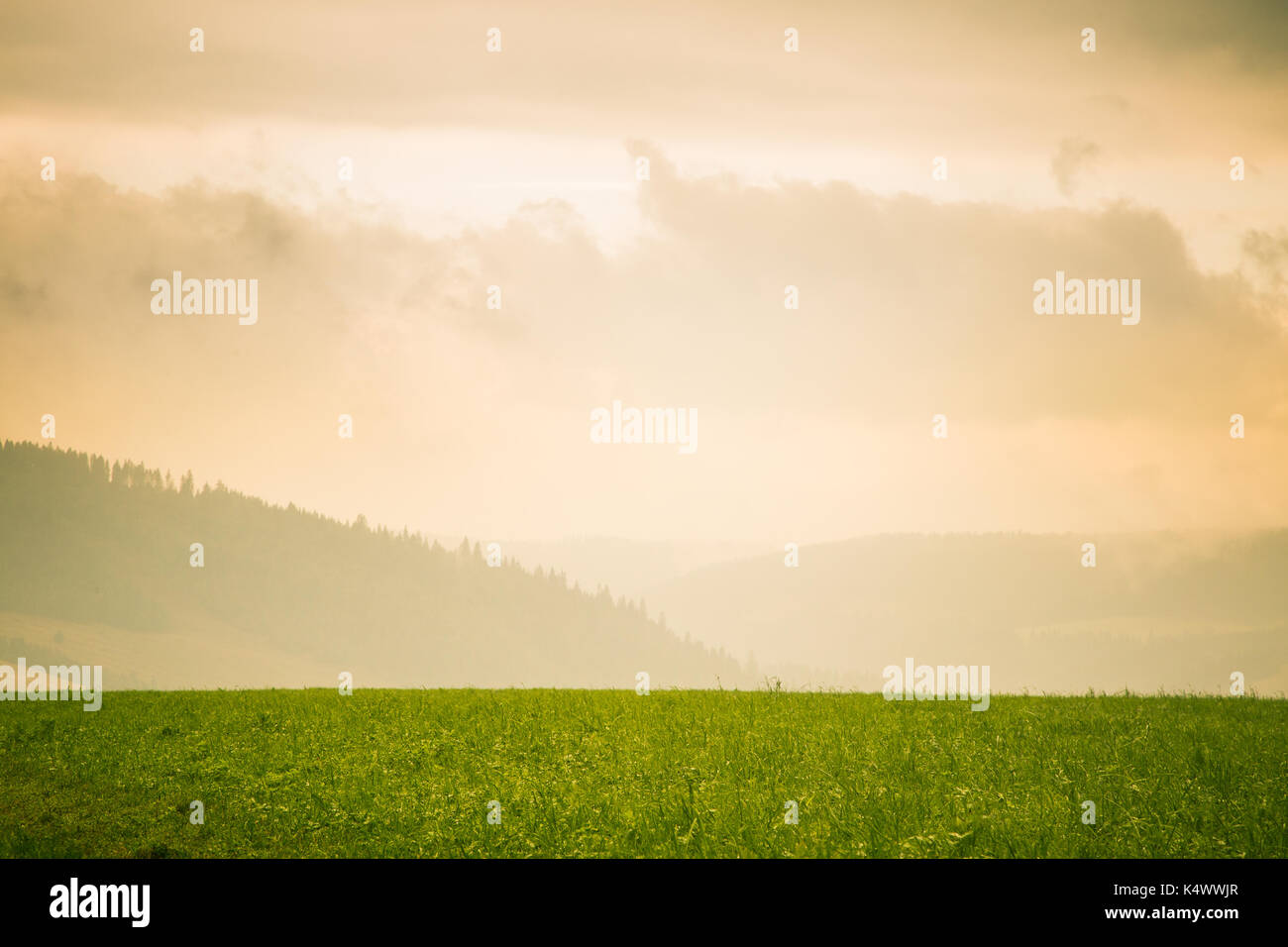 A beautiful, colorful, abstract mountain landscape with a hot summer ...