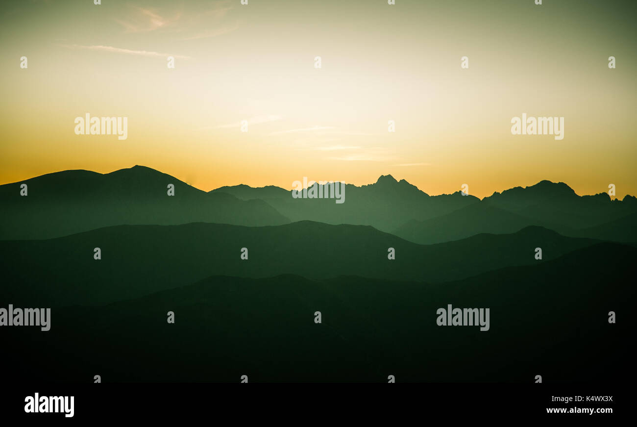 A beautiful, colorful, abstract mountain landscape with a hot summer ...