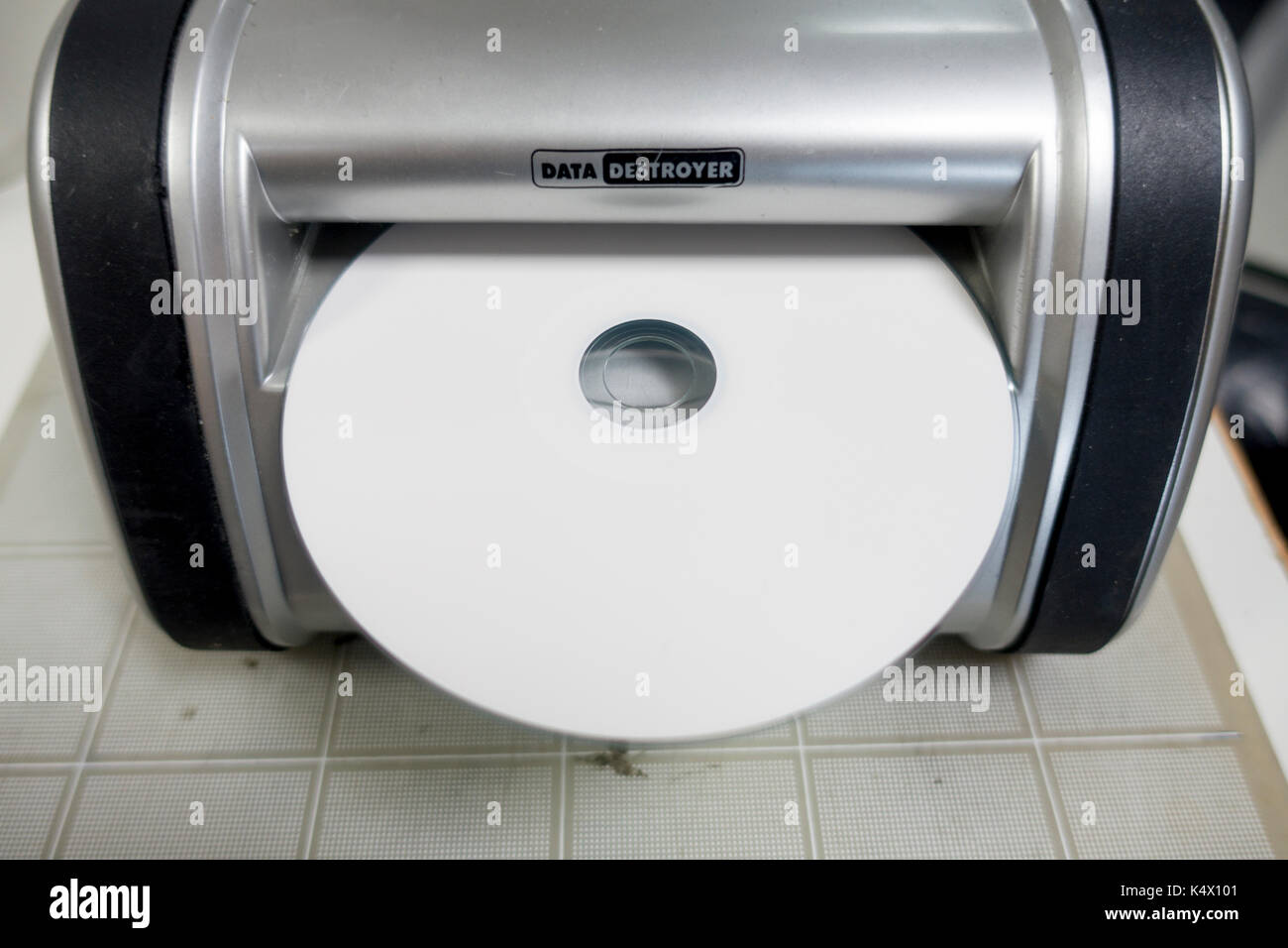 Data destruction on a compact disc or CD using a data destroyer that ...