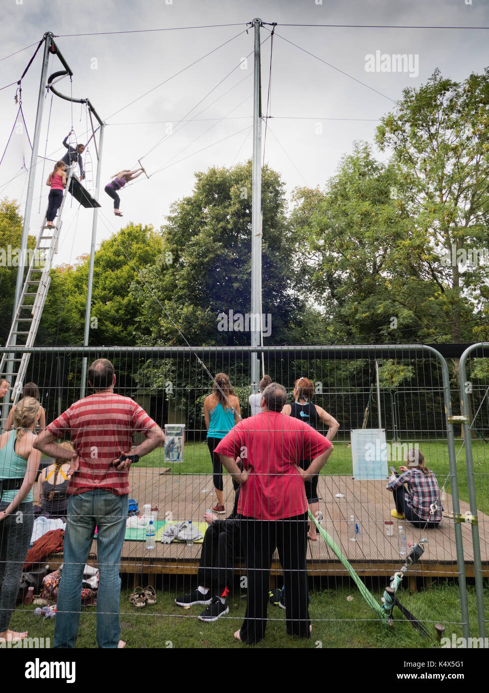 Trapeze lessons in Regents Park, London, UK Stock Photo - Alamy