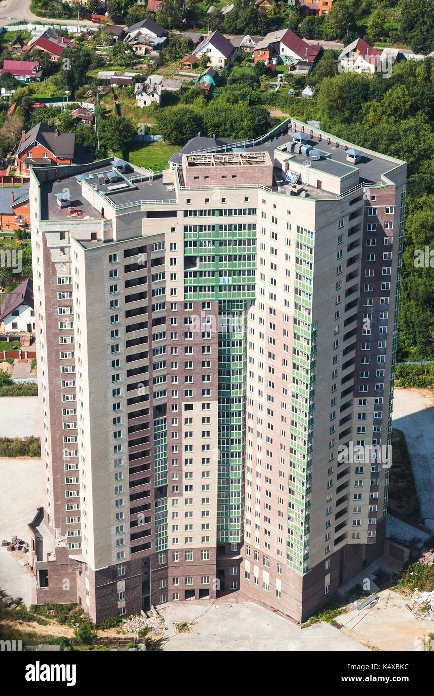 above view of new high-rise apartment house in suburb of Istra town in ...