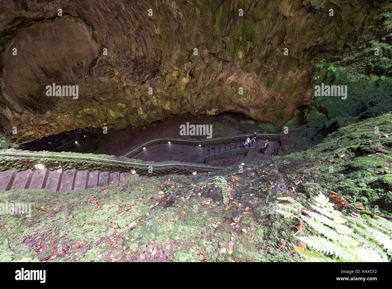 Visiting lava cave in hi-res stock photography and images - Alamy