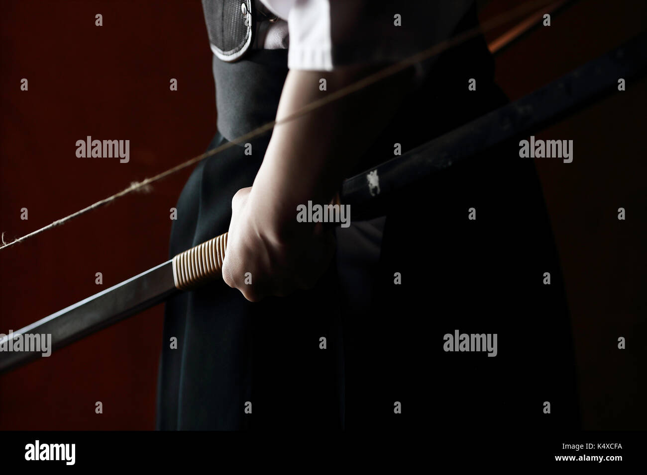 Japanese traditional archery athlete hand holding bow Stock Photo - Alamy