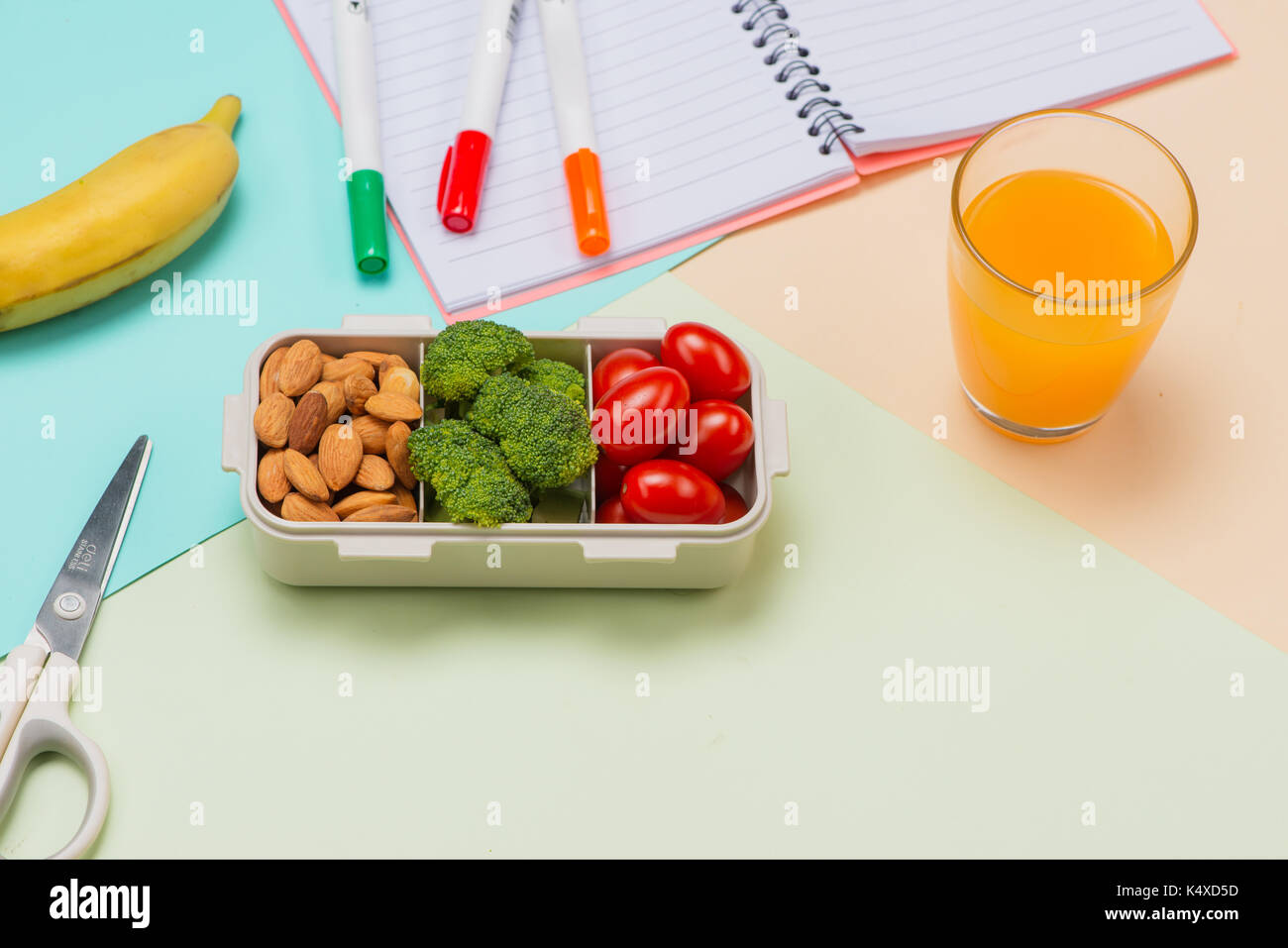 School breakfast on desk with books and pen on board background Stock ...