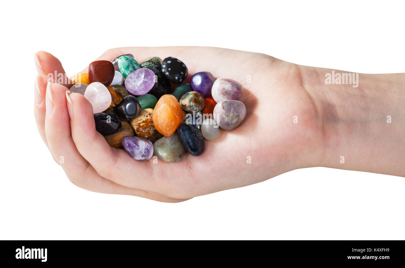 handful with various gems isolated on white background Stock Photo - Alamy