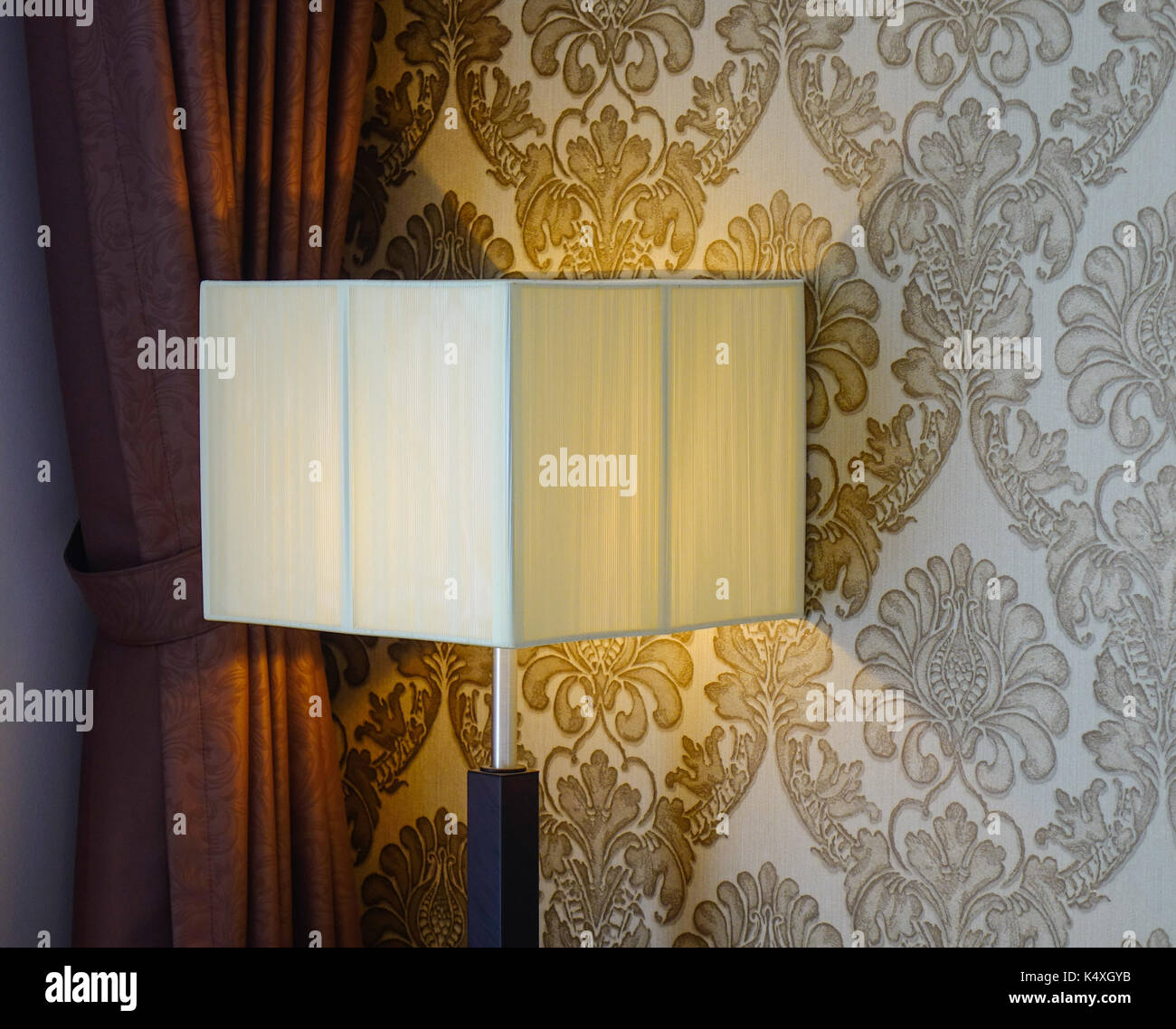 Elegant lamp with yellow light at living room of modern house Stock ...