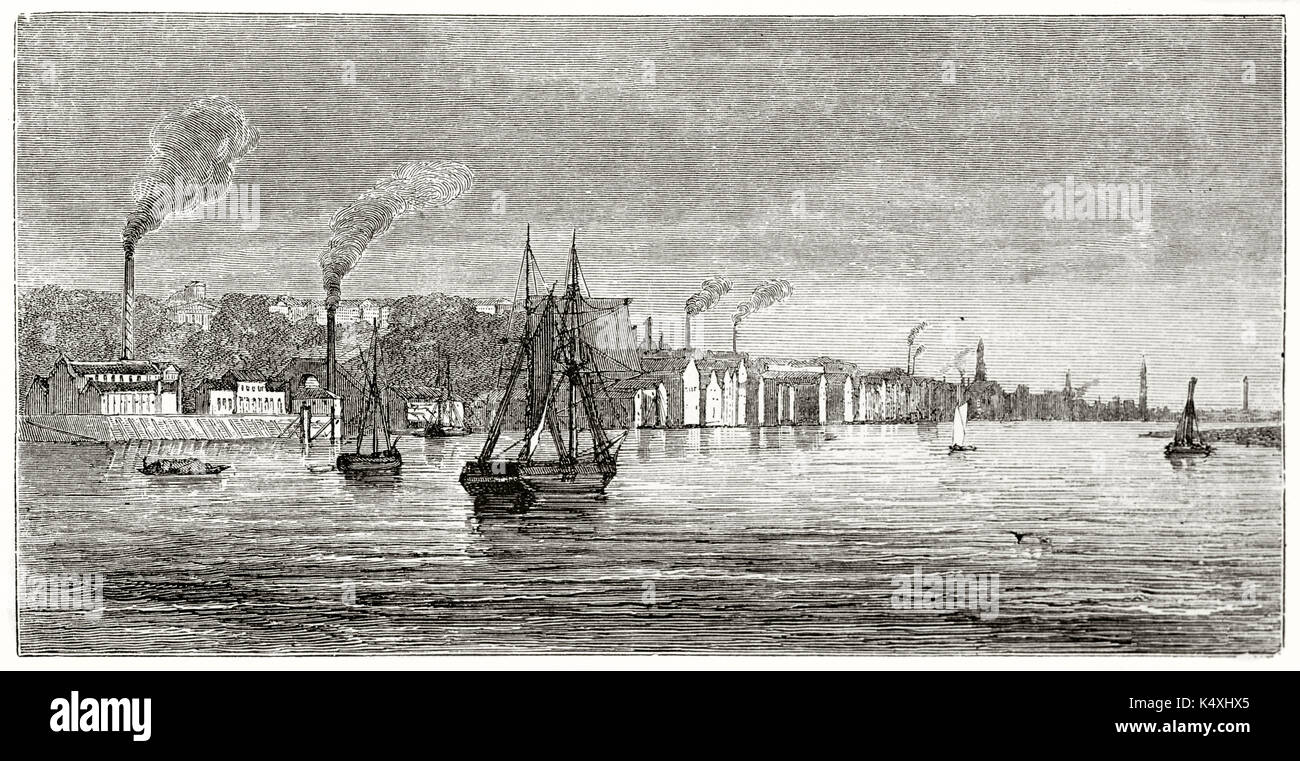 Ancient docks, smoking factories and ships viewed from the sea. Altona ...