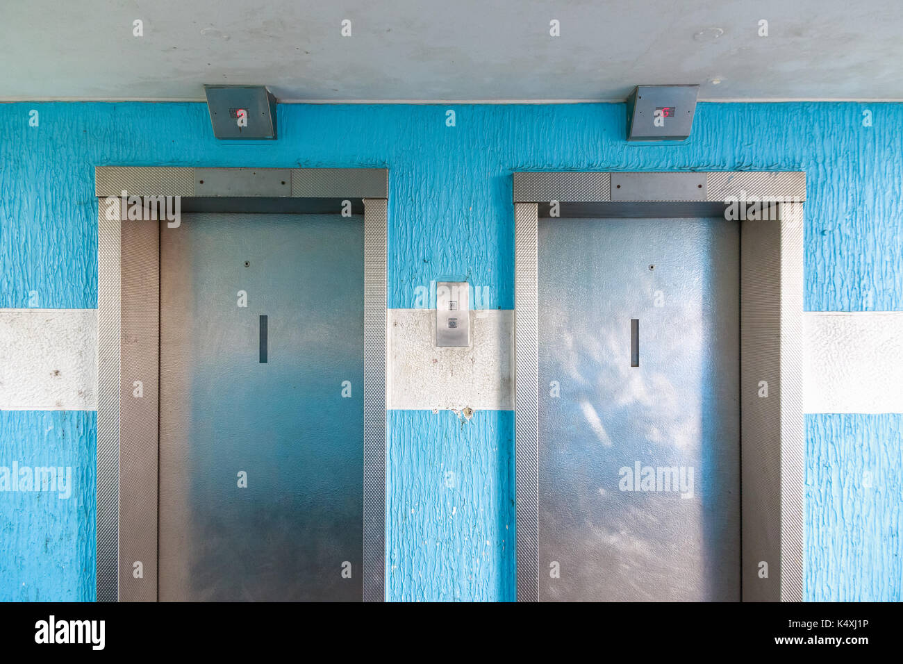 Two elevators in a council housing apartment in London Stock Photo - Alamy